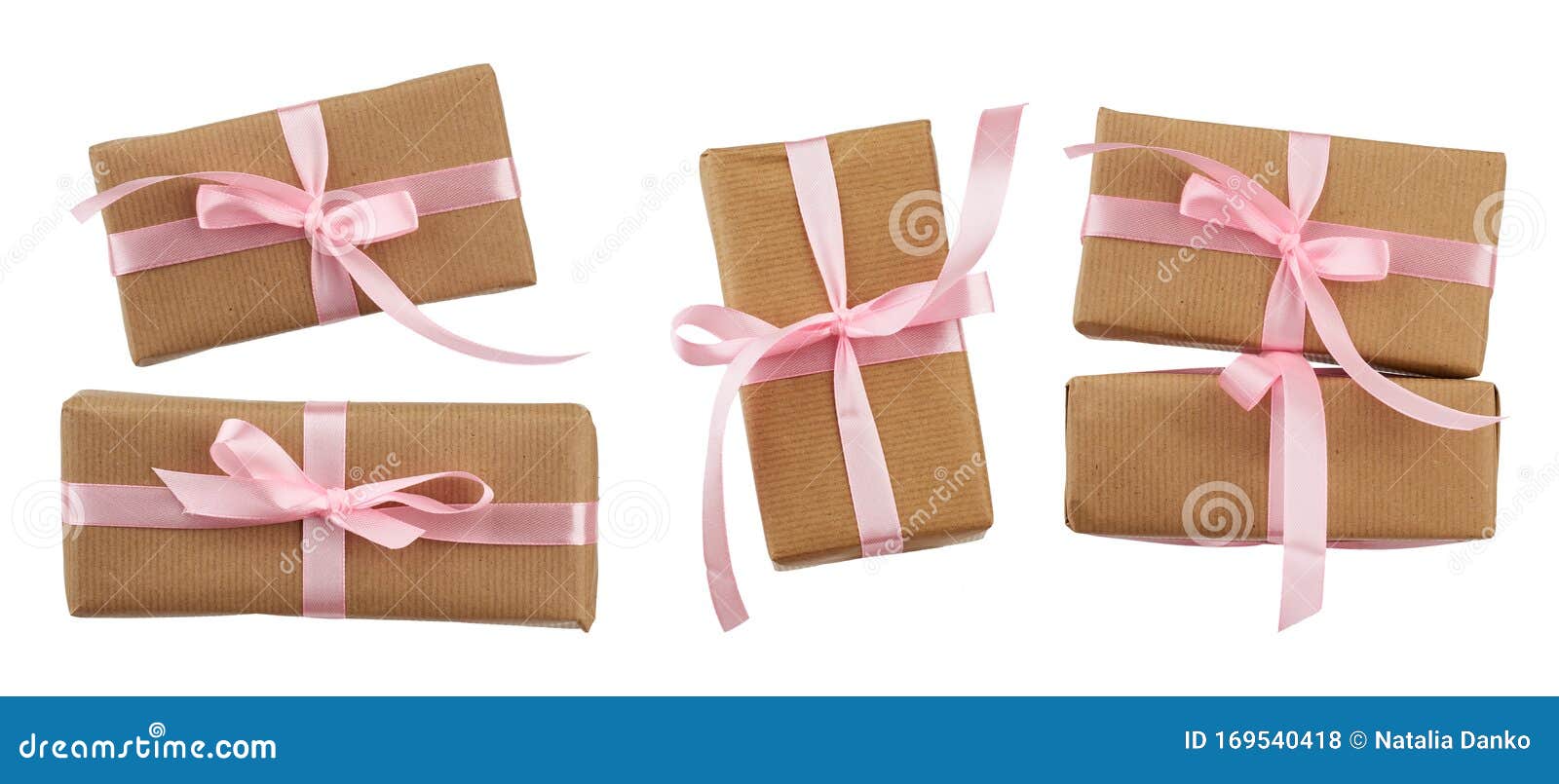 Set of Rectangular Boxes Wrapped in Brown Kraft Paper and Tied with a ...