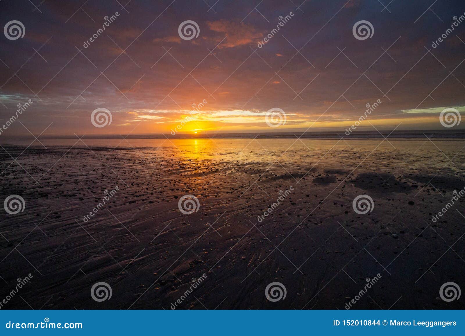 Set Set on a Reflective Beach in Granity Stock Photo - Image of ...