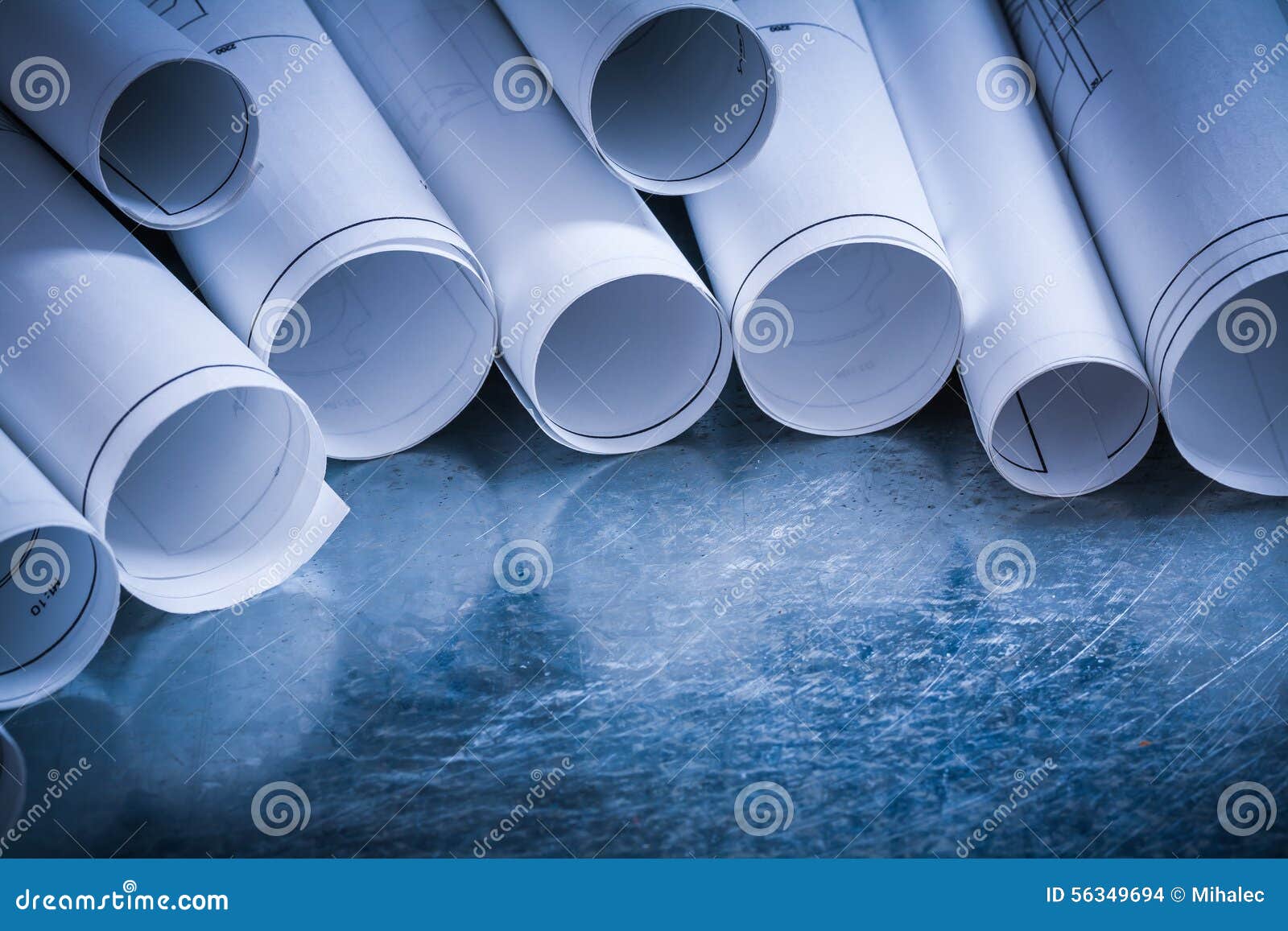 Set of Rolled Up White Construction Drawings on Stock Photo - Image of ...