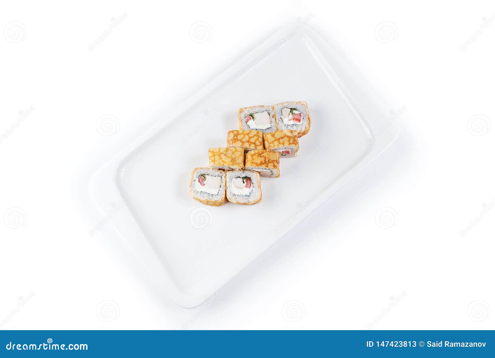 Set of Rolls with Pancakes on a Rectangular Plate on an Isolated White ...