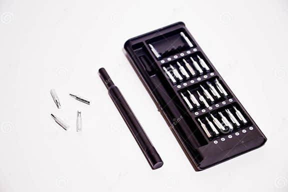 Set of Screwdriver Bits in a Black Box on a White Background. Tools ...