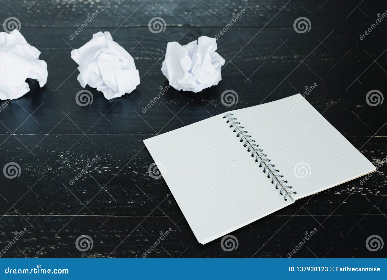 Set of Scrunched Paper Balls and Empty Notepad on Dark Moody Background ...