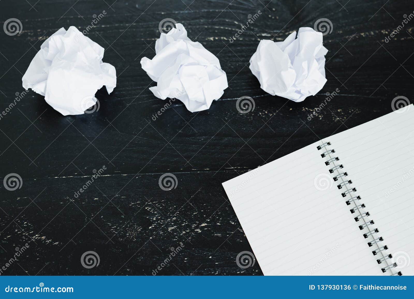 Set of Scrunched Paper Balls and Empty Notepad on Dark Moody Background ...