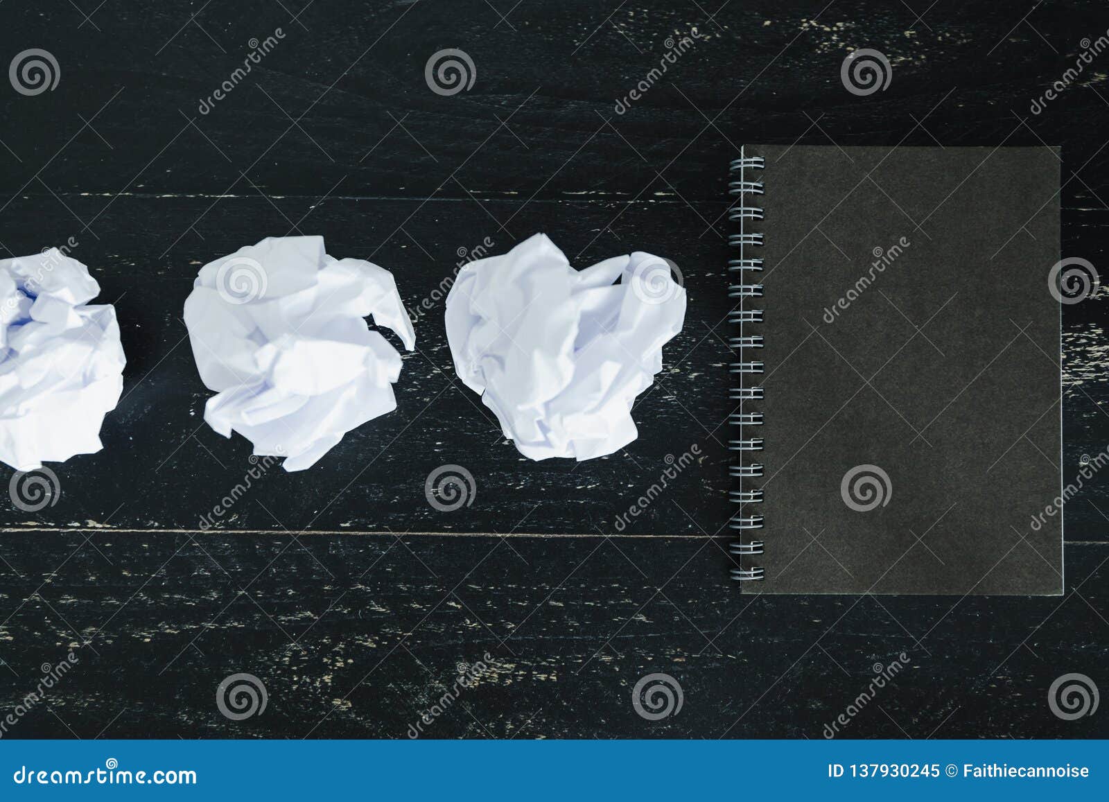 Set of Scrunched Paper Balls and Empty Notepad on Dark Moody Background ...