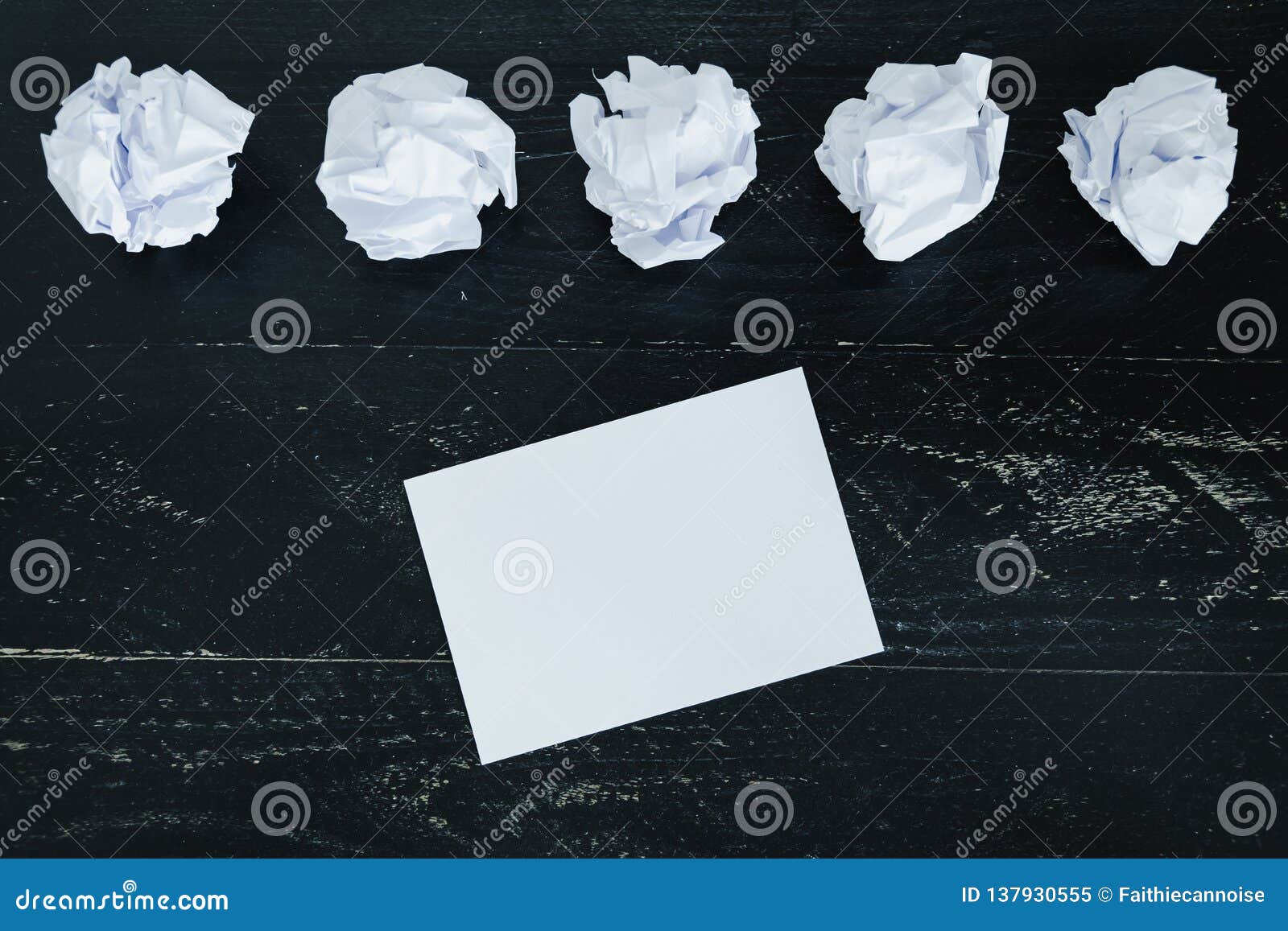Set of Scrunched Paper Balls and Empty Notepad on Dark Moody Background ...