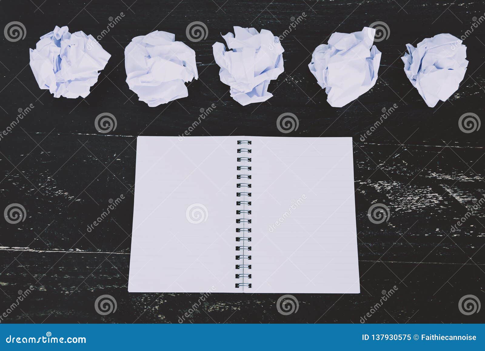 Set of Scrunched Paper Balls and Empty Notepad on Dark Moody Background ...