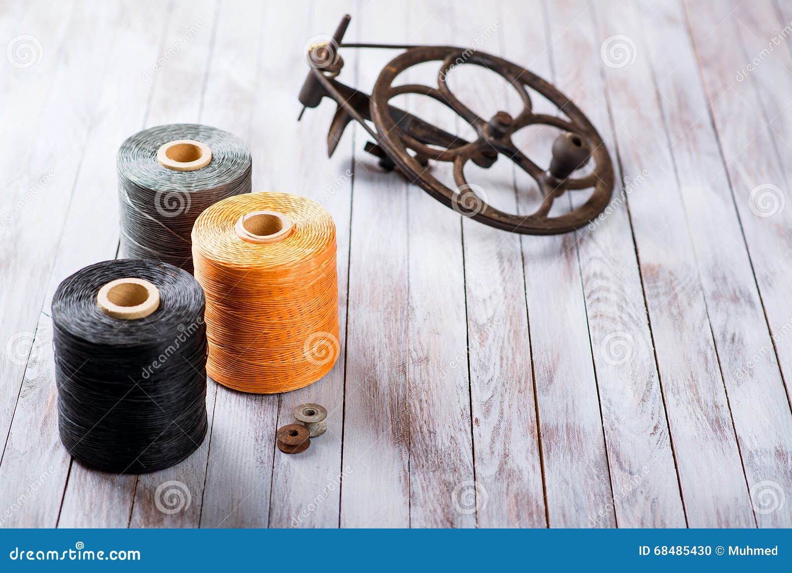 Set of Sewing Threads for Shoes on a Wooden Background Stock Photo ...