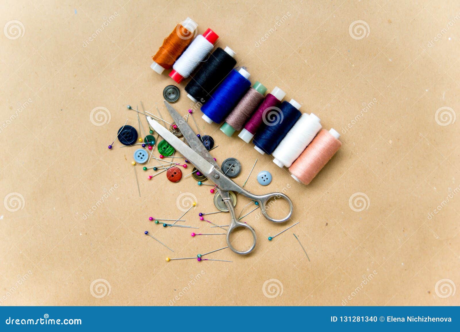 Set of Sewing Tools - Scissors, Needles, Buttons, Thread on a Table ...