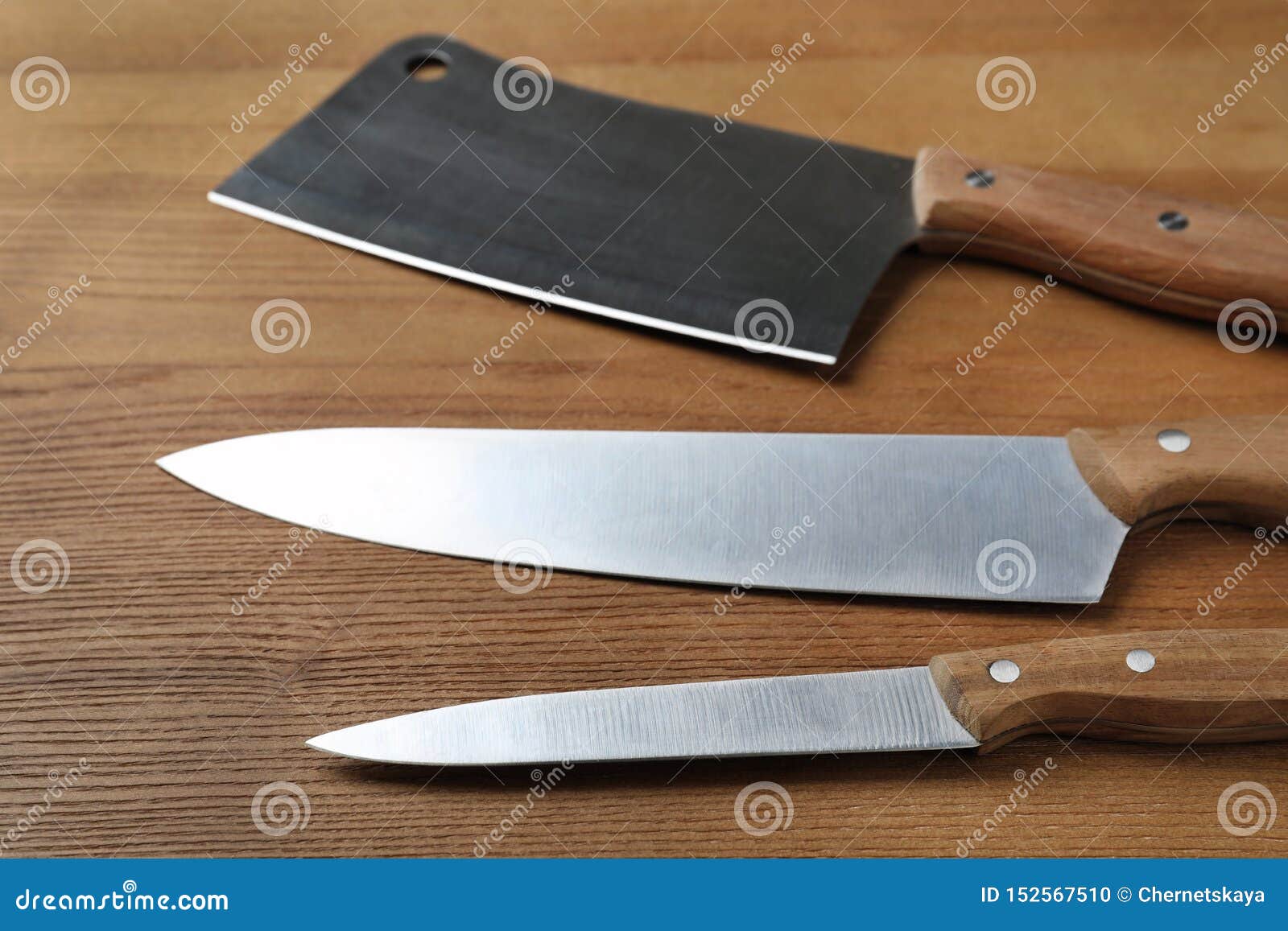 Set of Sharp Kitchen Knives on Table Stock Photo - Image of metal ...