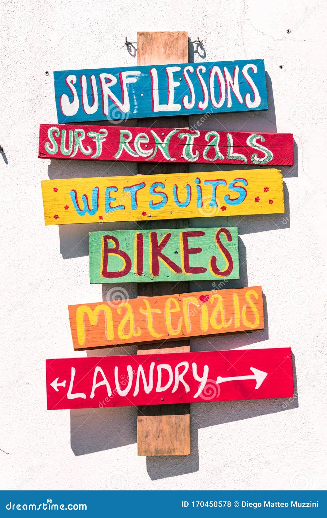 Colorful Signs and Indication Stock Photo - Image of wetsuits, wood ...