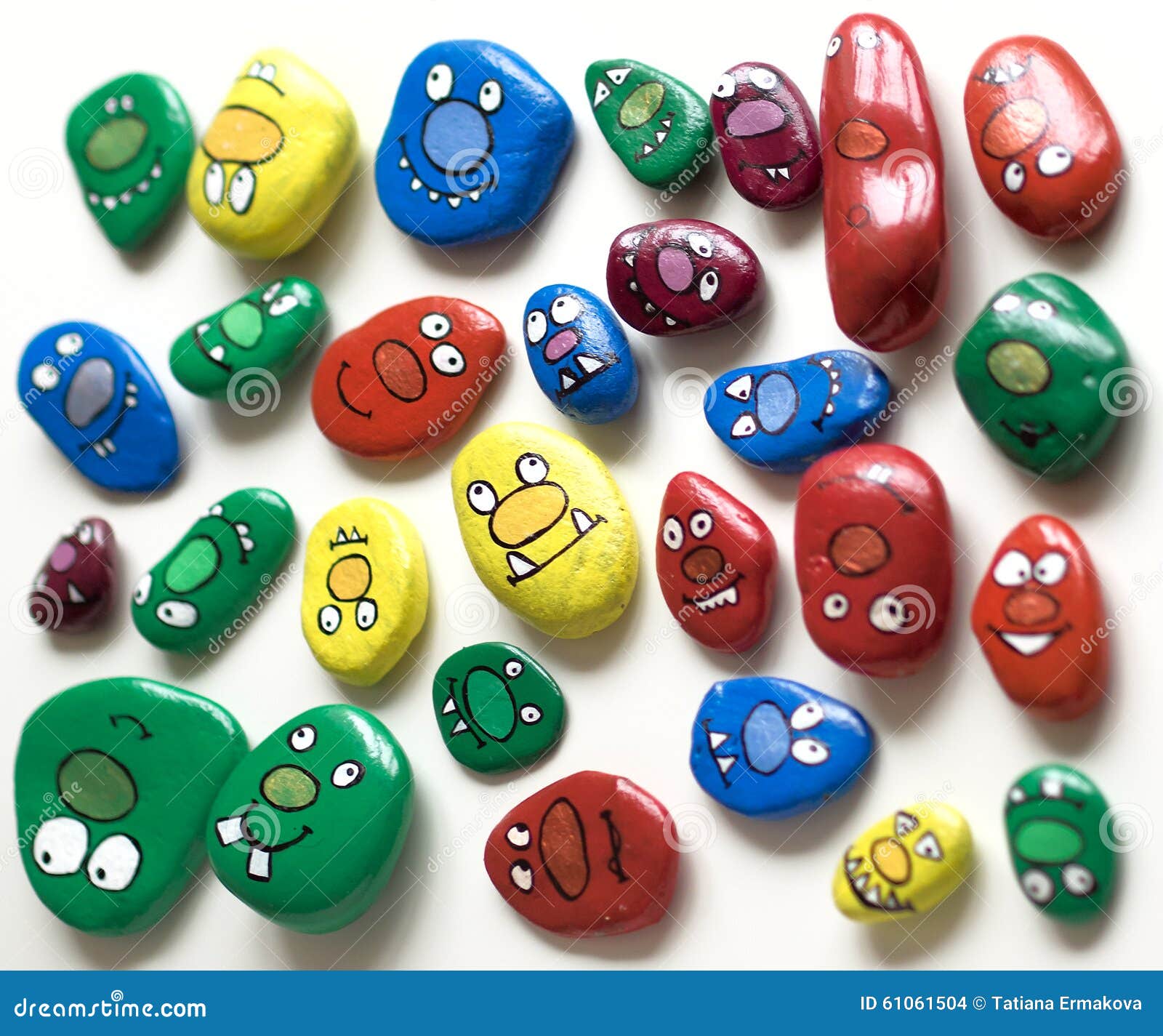 Set of Smiling Faces of Monsters. Painted Acrylic Pebbles. Stock Photo ...