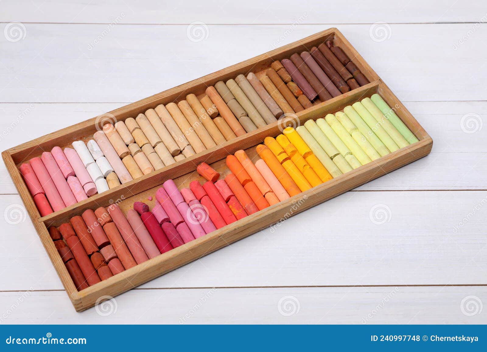Set of Soft Pastels in Box on White Wooden Table. Drawing Material ...