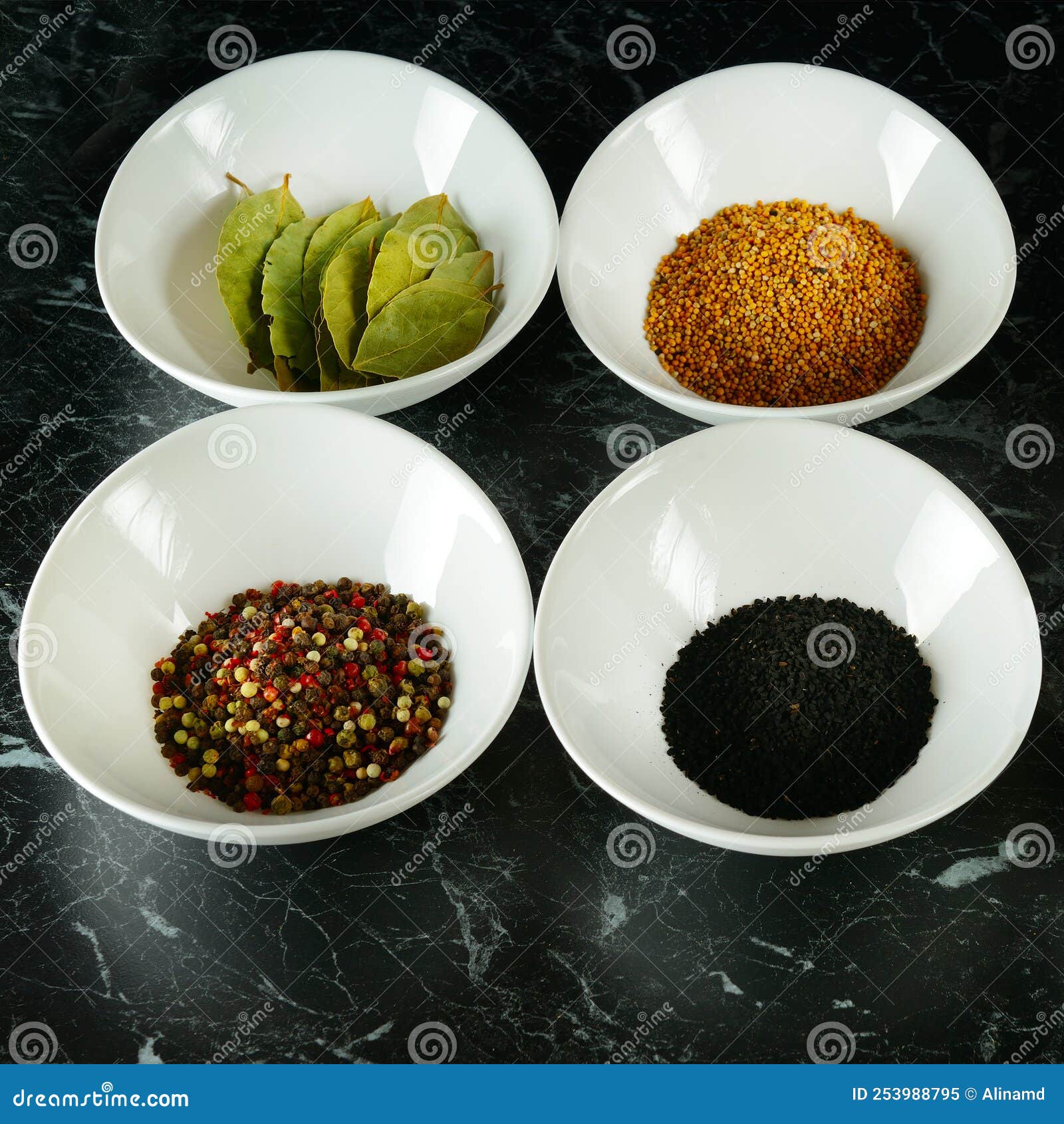 A Set of Spices in White Plates on a Black Stock Image - Image of ...