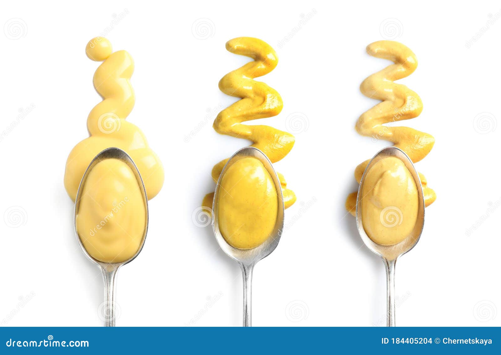 Set of Spoons with Different Delicious Sauces on Background, Top View ...