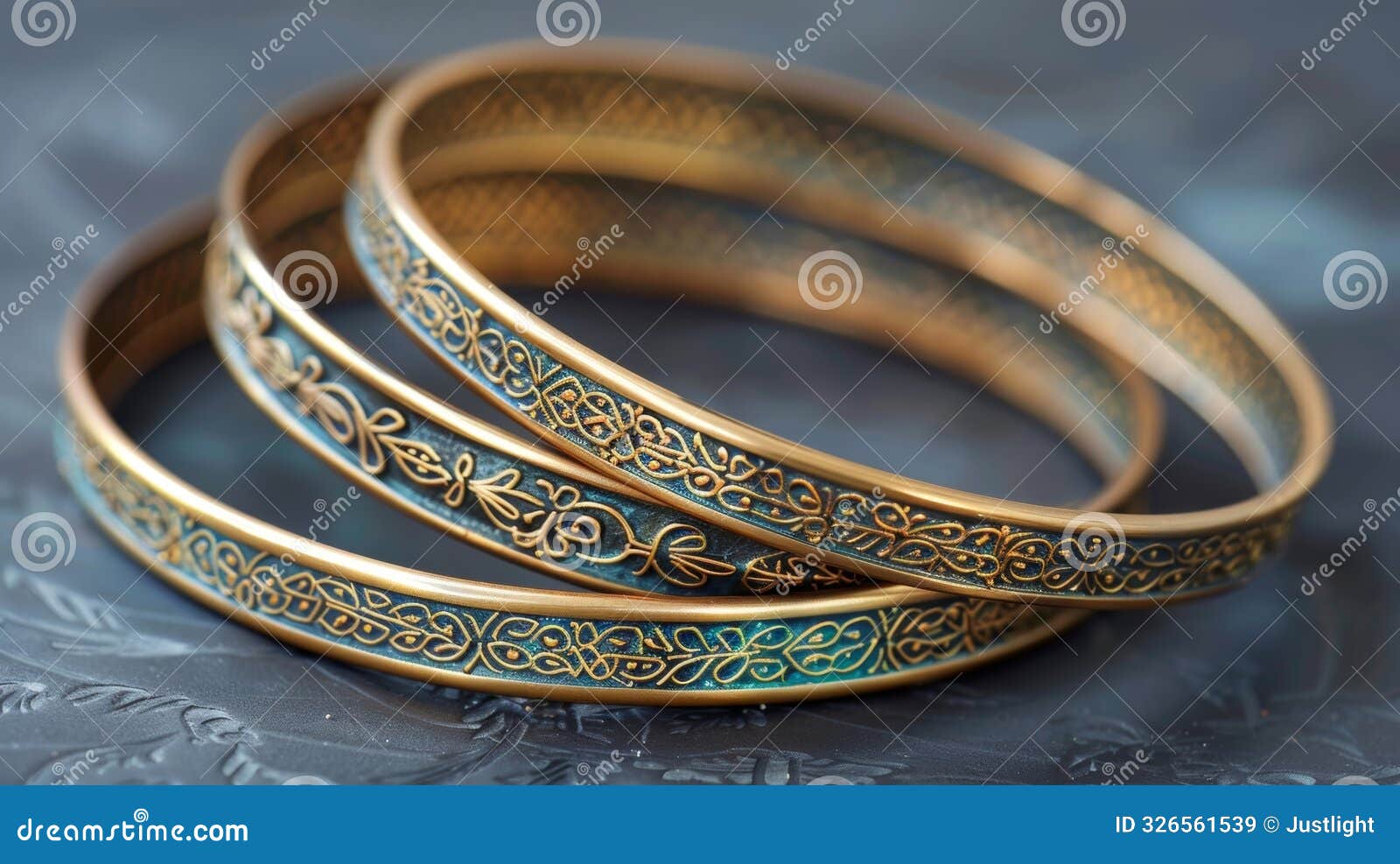 A Set of Stackable Bangles with Intricate Etched Patterns Perfect for ...