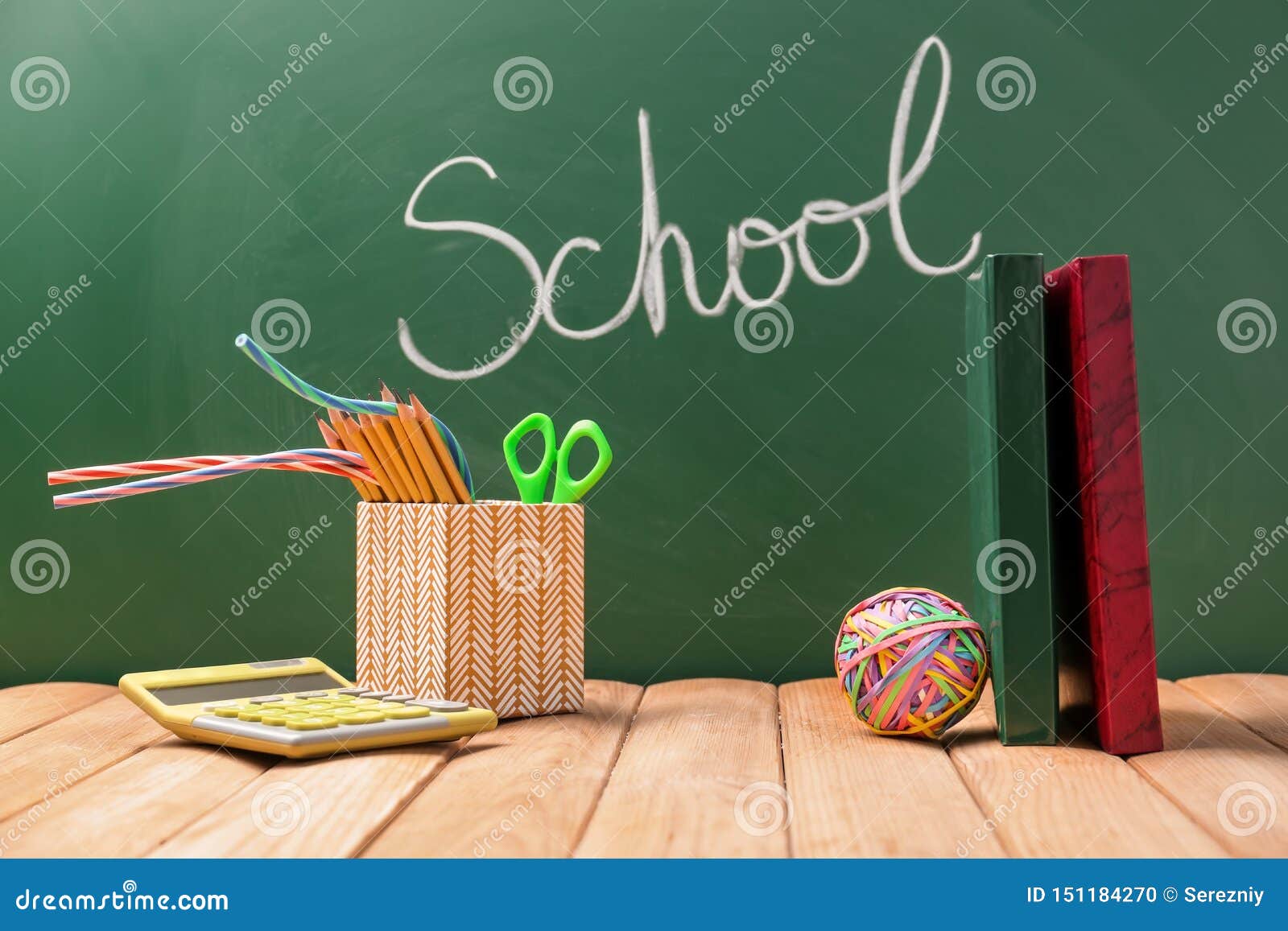 Set of Stationery on Table and Word SCHOOL Written on Chalkboard Stock ...