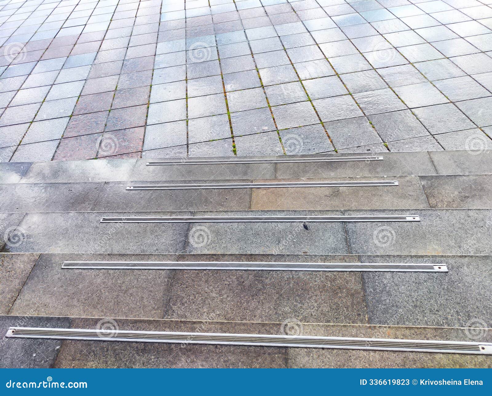 A Set of Stone Steps with Metal Grates Embedded in Each Step. the Steps ...