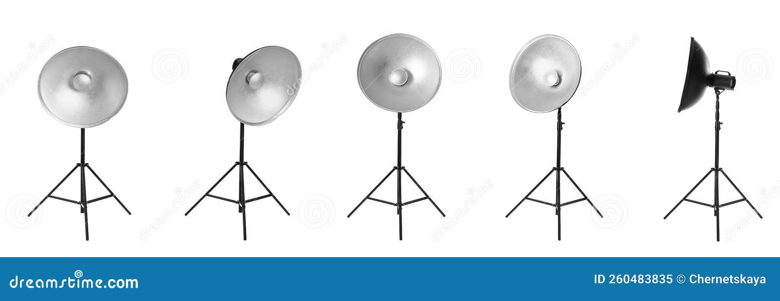 Set with Studio Flash Lights with Reflectors on Tripods Against White ...