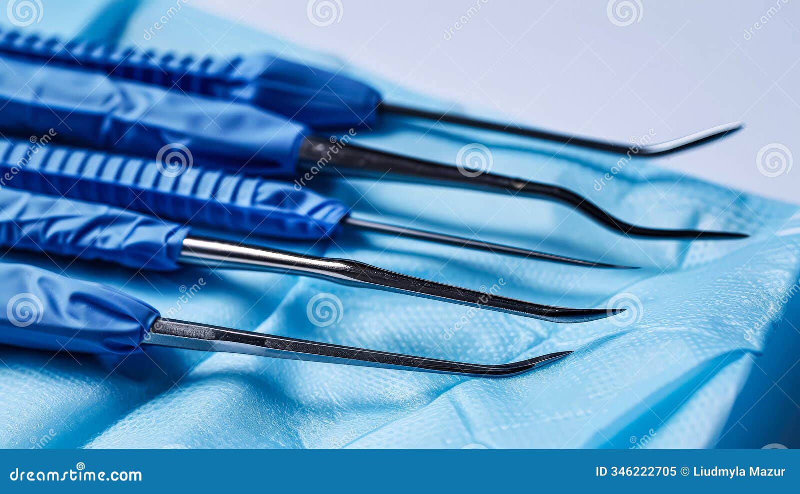 Set of Surgical Instruments are Displayed on a Blue Cloth Stock Image ...