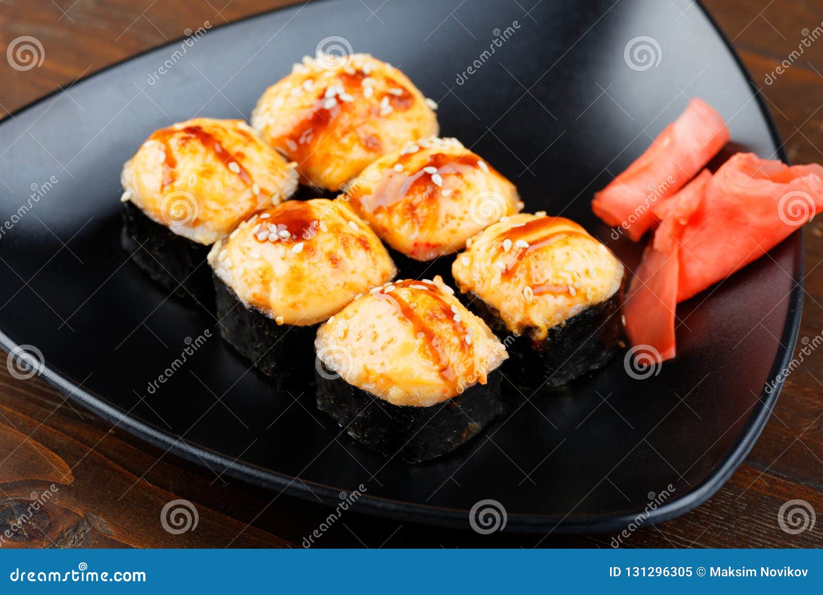 Set Sushi on a Black Triangular Plate with Ginger Closeup. Stock Image ...