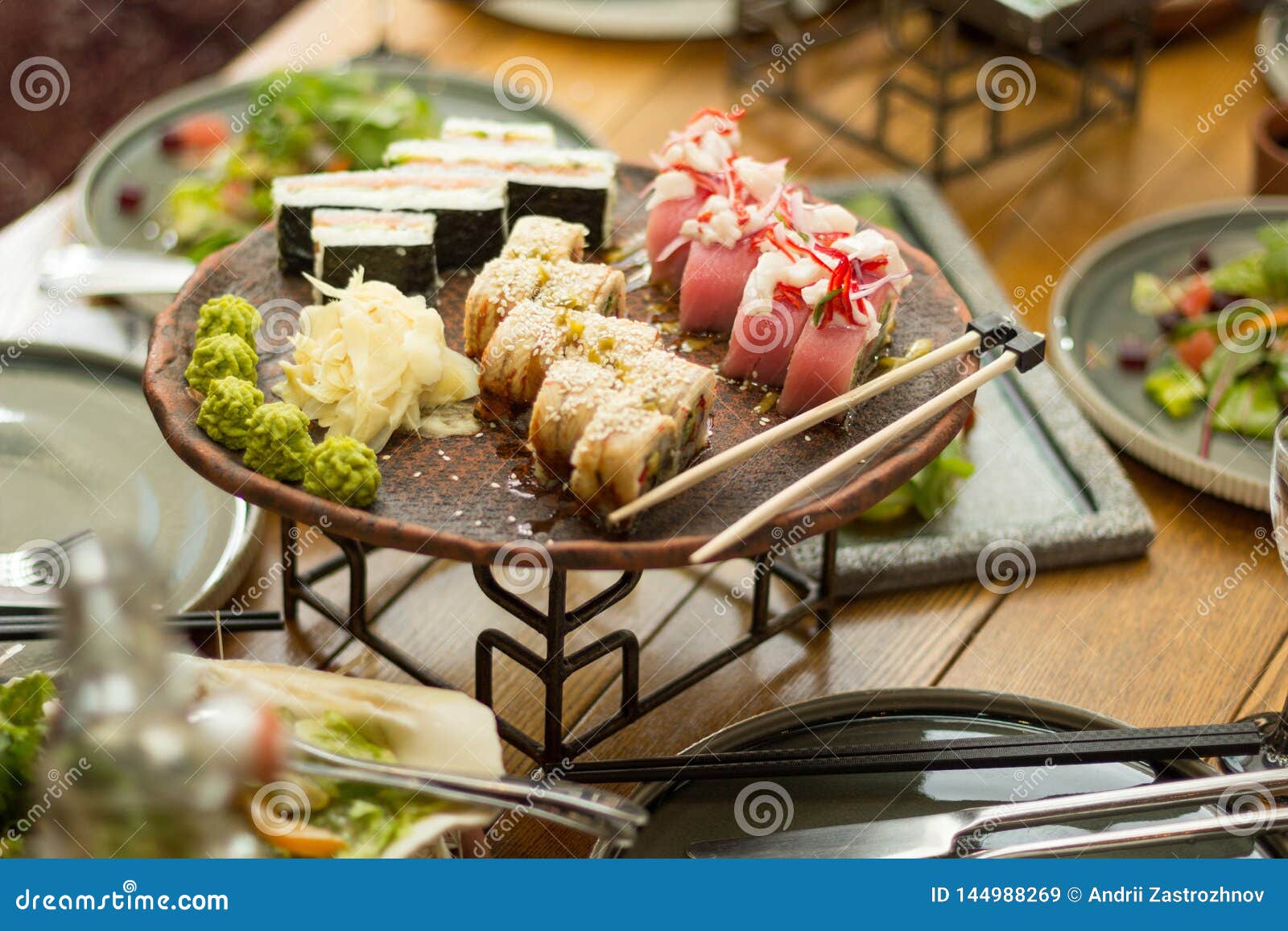 A Set of Sushi in a Restaurant on the Table, Selective Focus. Lunch ...