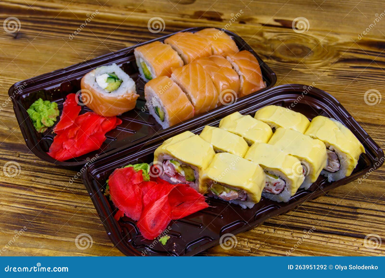 Set of Sushi Rolls in Plastic Boxes on Wooden Table. Sushi for Take ...