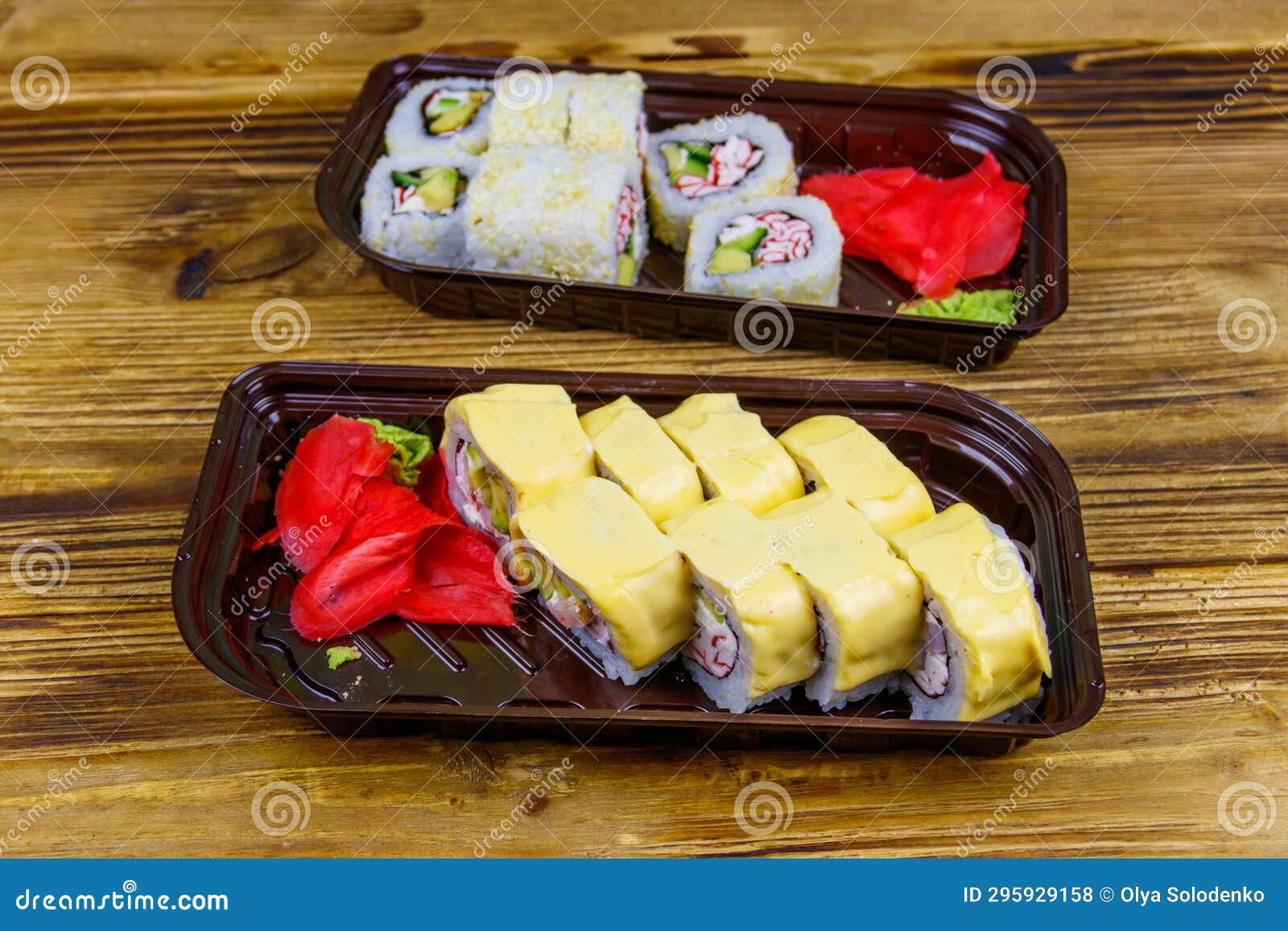 Set of Sushi Rolls in Plastic Boxes on Wooden Table. Sushi for Take ...