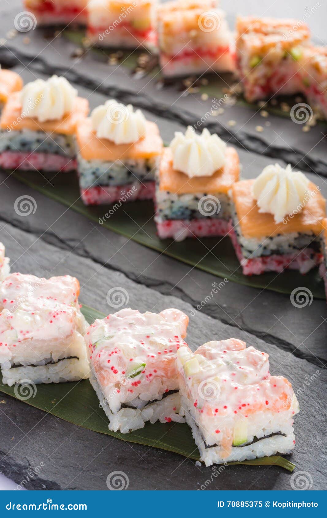 Set of Sushi on a Slate Square Plate. Stock Image - Image of hand ...
