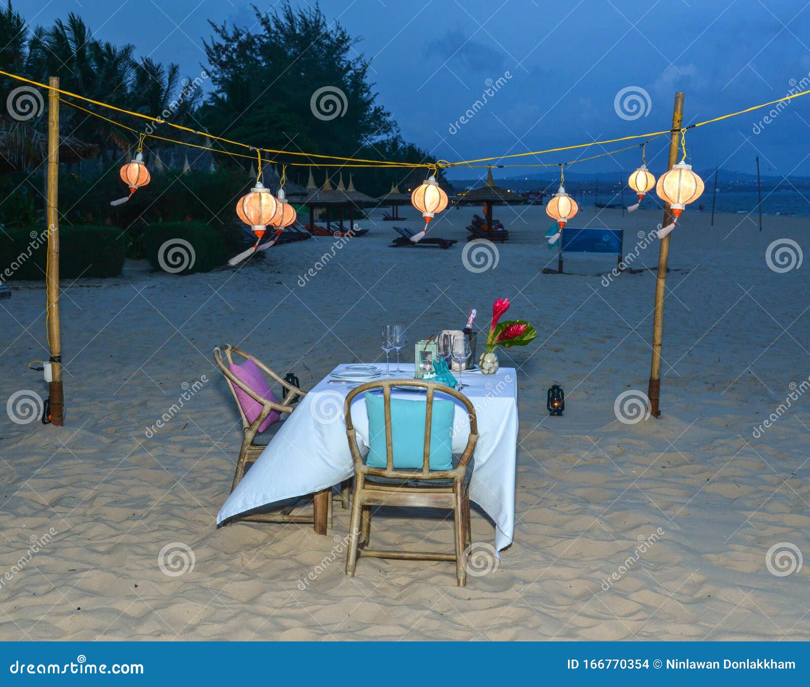 Set the Table for Dinner on the Beach Stock Photo - Image of dinnerware ...