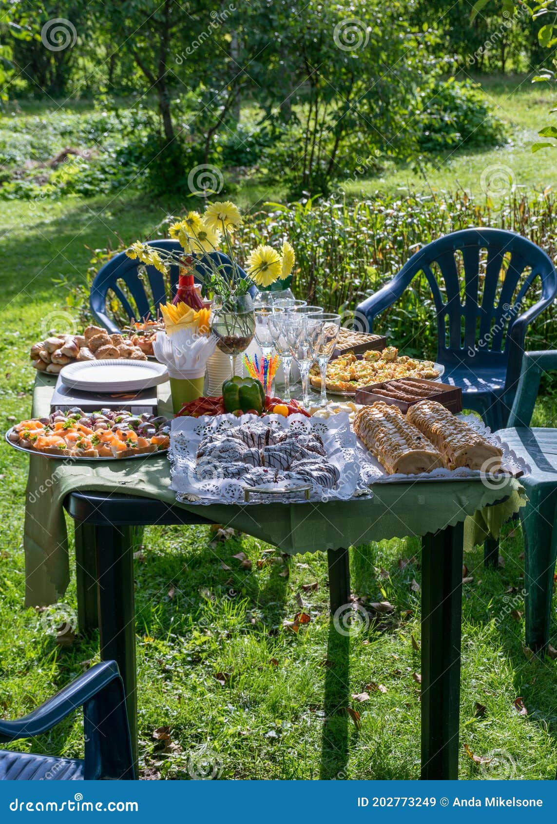 A Set Table for the Garden Party, Various Dishes on the Table, Grass ...