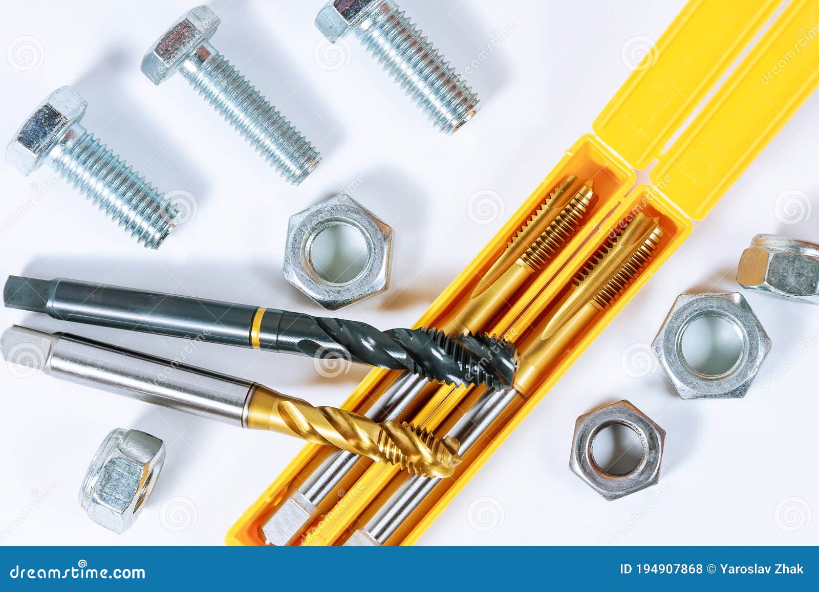 Set of Tap for Threading in Metal. Bolts and Nuts Isolated on White ...
