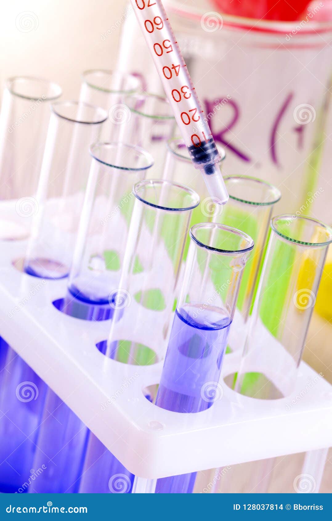 Set of Test Tubes with Blue Liquid on the Desktop. Stock Photo - Image ...