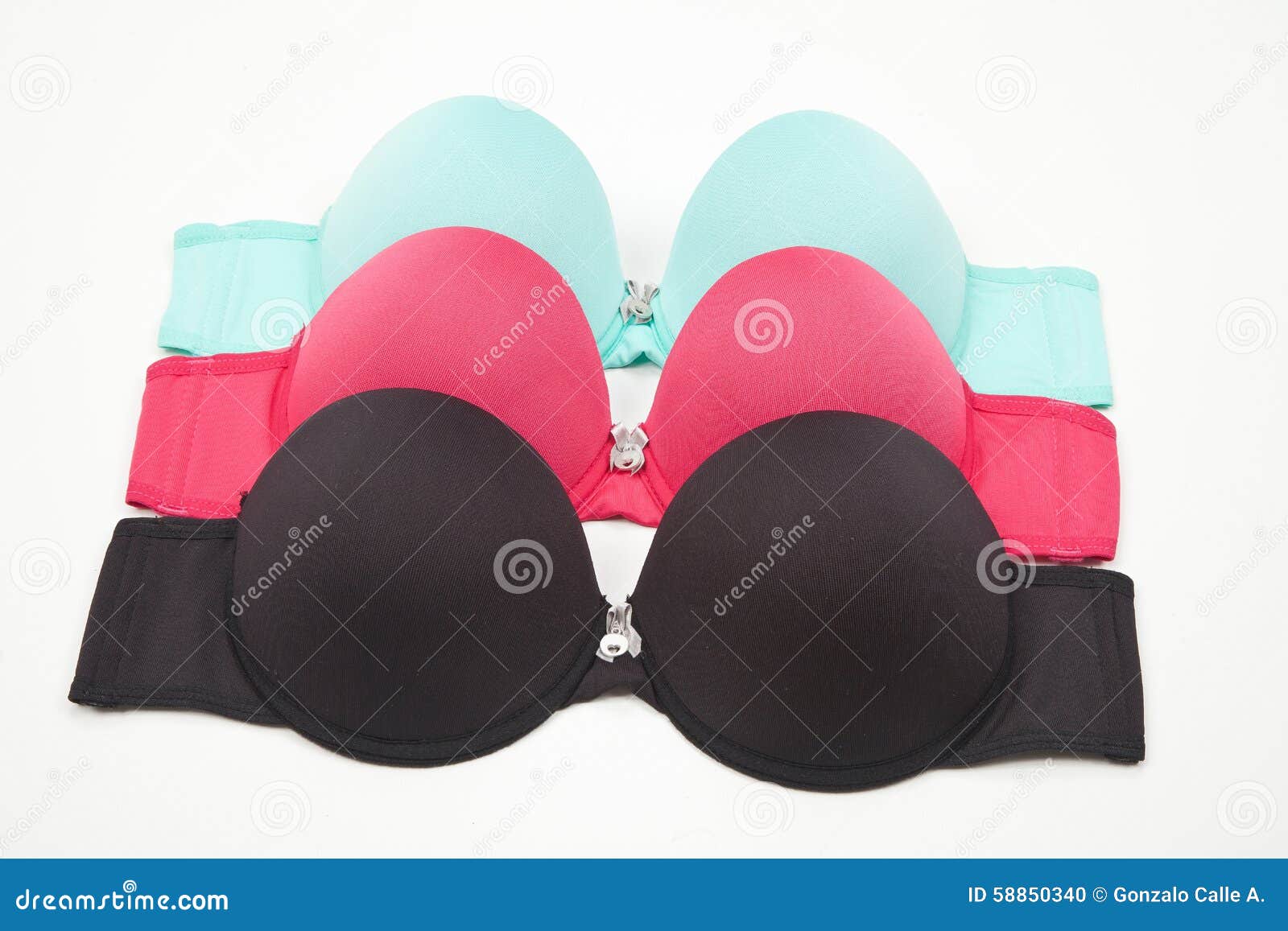 Set of Three Bras in Different Colors on White Background Stock Photo ...