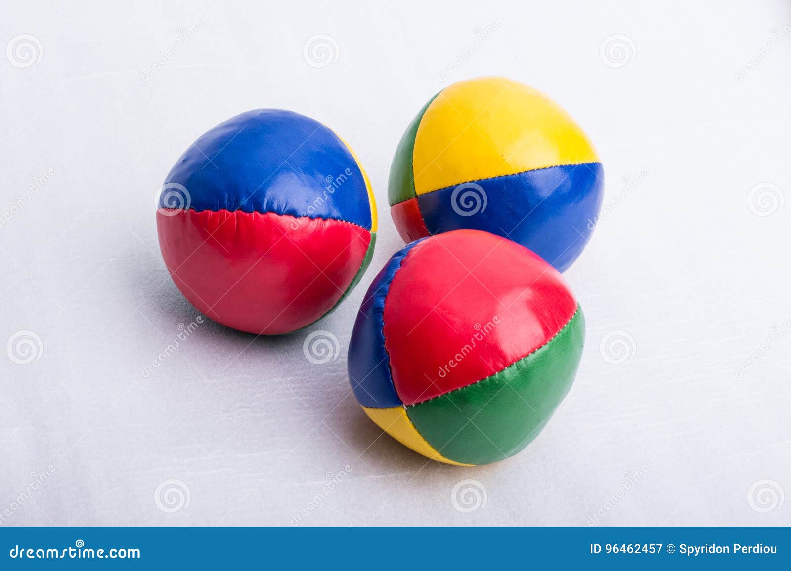 A Set of Three Colorful Juggling Balls on a White Surface Stock Image ...