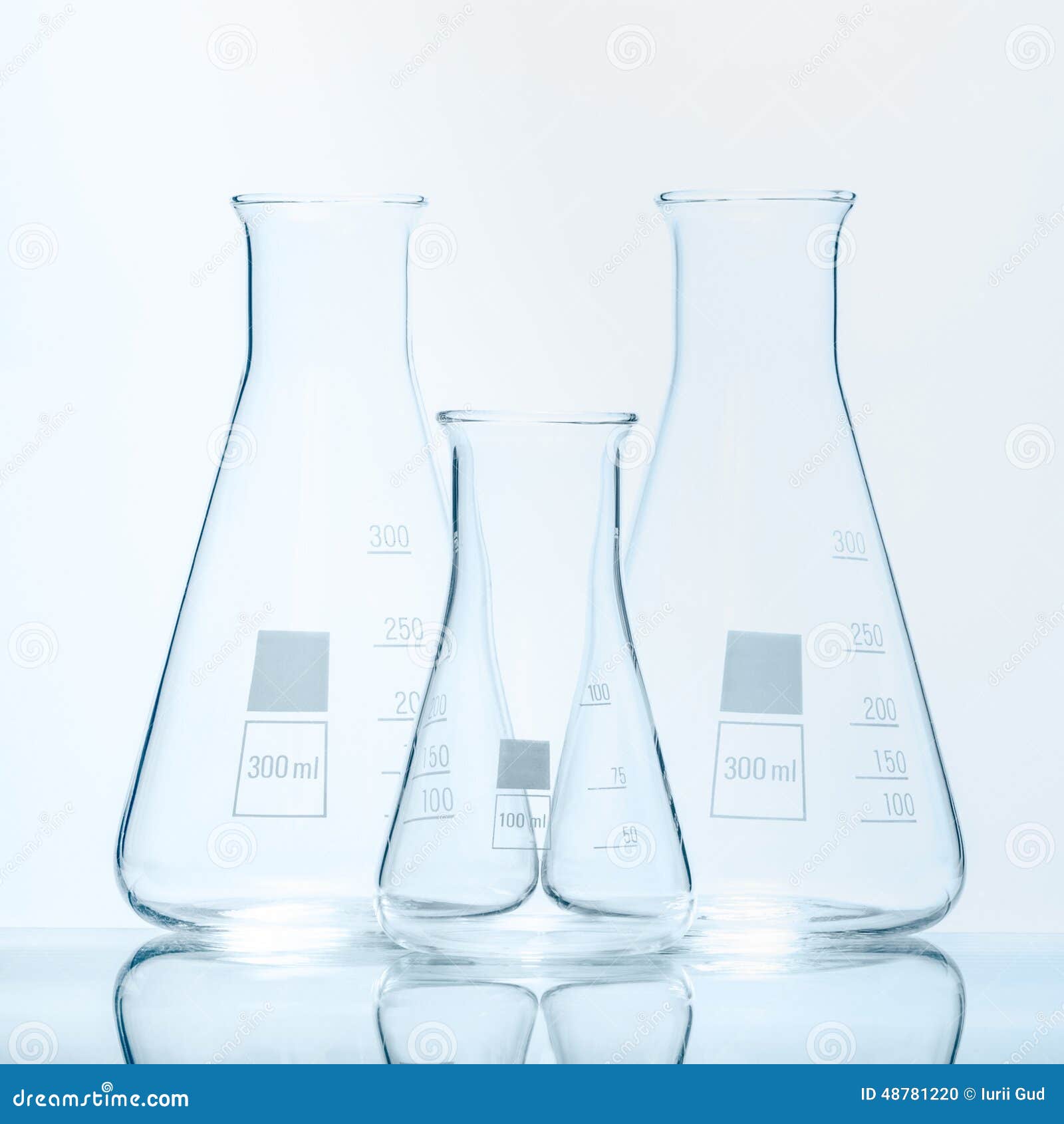 Conical Flasks With Red Liquid On Background. Laboratory Glassware ... Conical Flasks With Red Liquid On Background. Laboratory Glassware ...