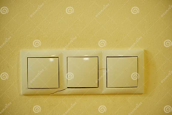 Set of Three Light Switch on the Wall Stock Photo - Image of electrical ...