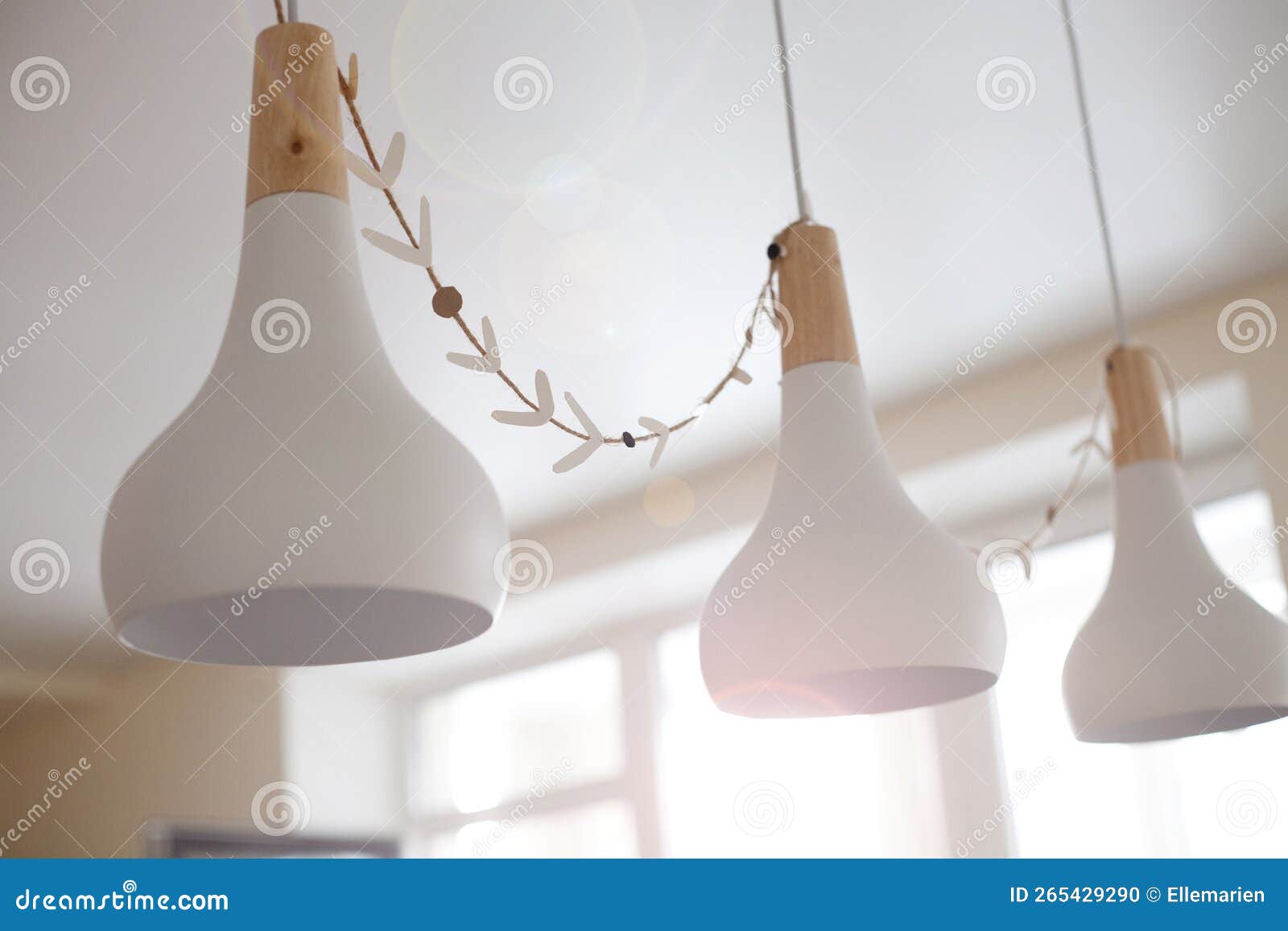 A Set of Three White Ceiling Lights with Sunlight Stock Photo - Image ...