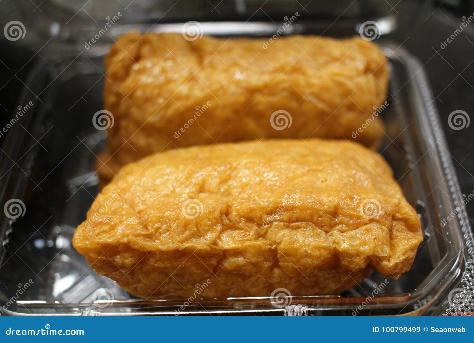 The tofu wrapped rice stock image. Image of sushi, brown - 100799499