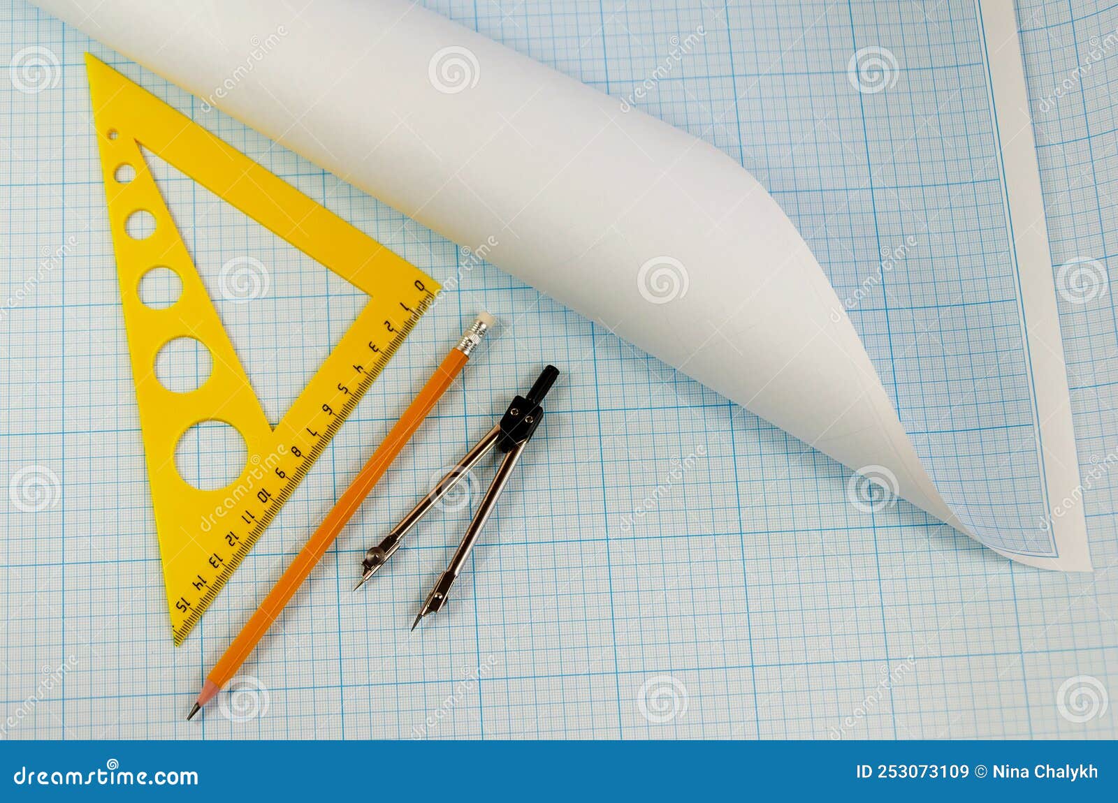 Set of Tools for Drawing on an Graph Paper. Ruler, Compass, Pencil on ...