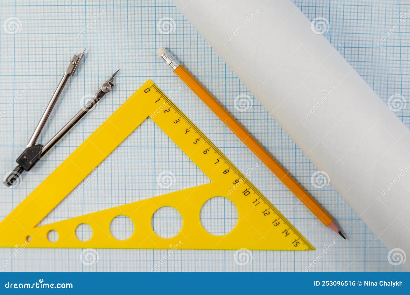 Set of Tools for Drawing on an Graph Paper. Ruler, Compass, Pencil on ...