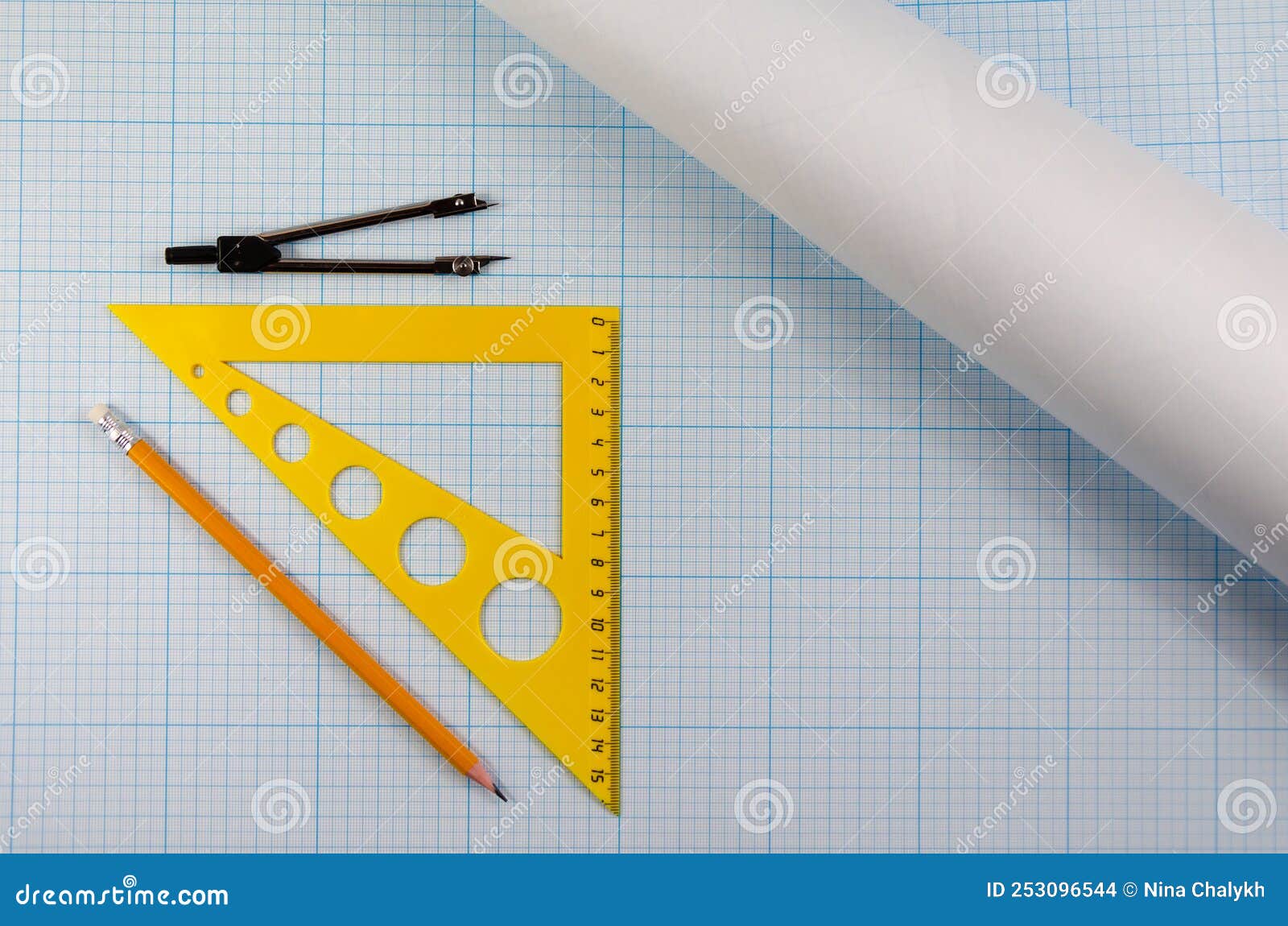 Set of Tools for Drawing on an Graph Paper. Ruler, Compass, Pencil on ...