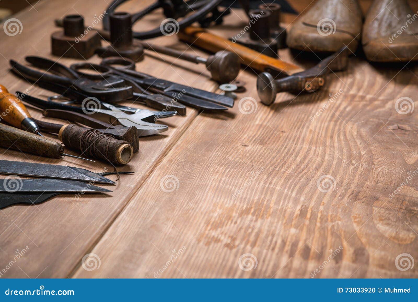 Set of Tools for Shoemaker on Wooden Background. Copy Space. Stock ...