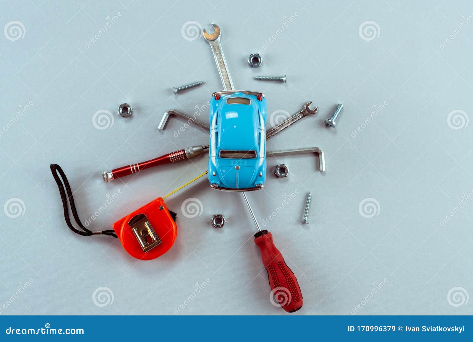 Set of Tools Wrenches with Blue Toy Car in the Centre Stock Image ...