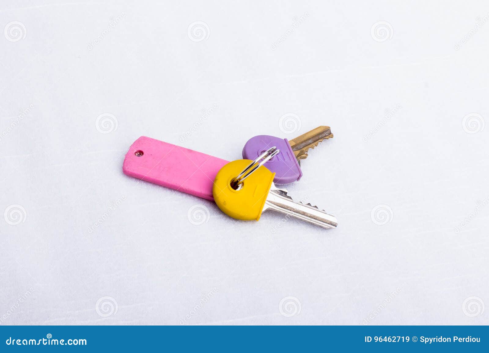 A Set of Two Keys, on a Key Ring, on a White Surface Stock Image ...