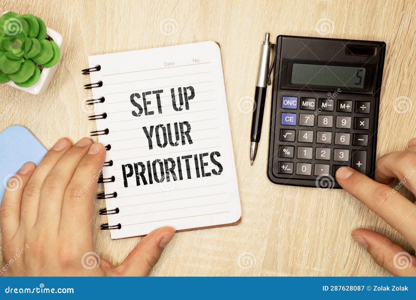 Set Up Your Priorities Sign on Notepad on the White Backgound Stock ...
