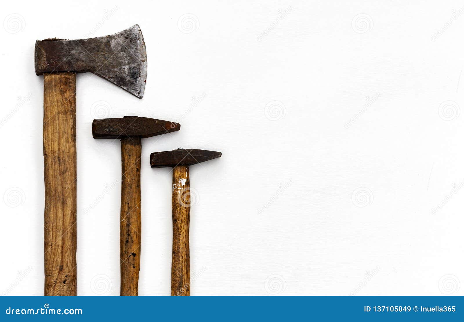 Set of Vintage Hand Construction Tools on a White Wooden Background ...