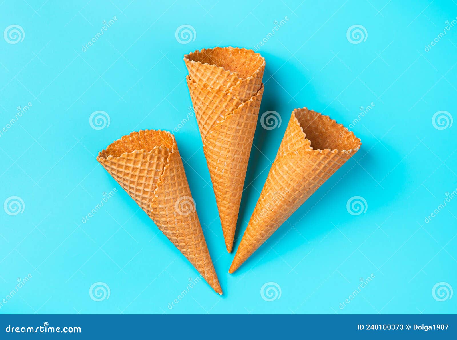 A Set of Waffle Cones for Ice Cream on a Light Blue Background. Stock ...