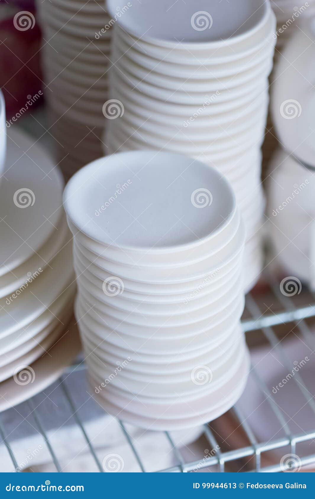 Set of White Dishes on White.Stack of Plates Stock Image - Image of ...