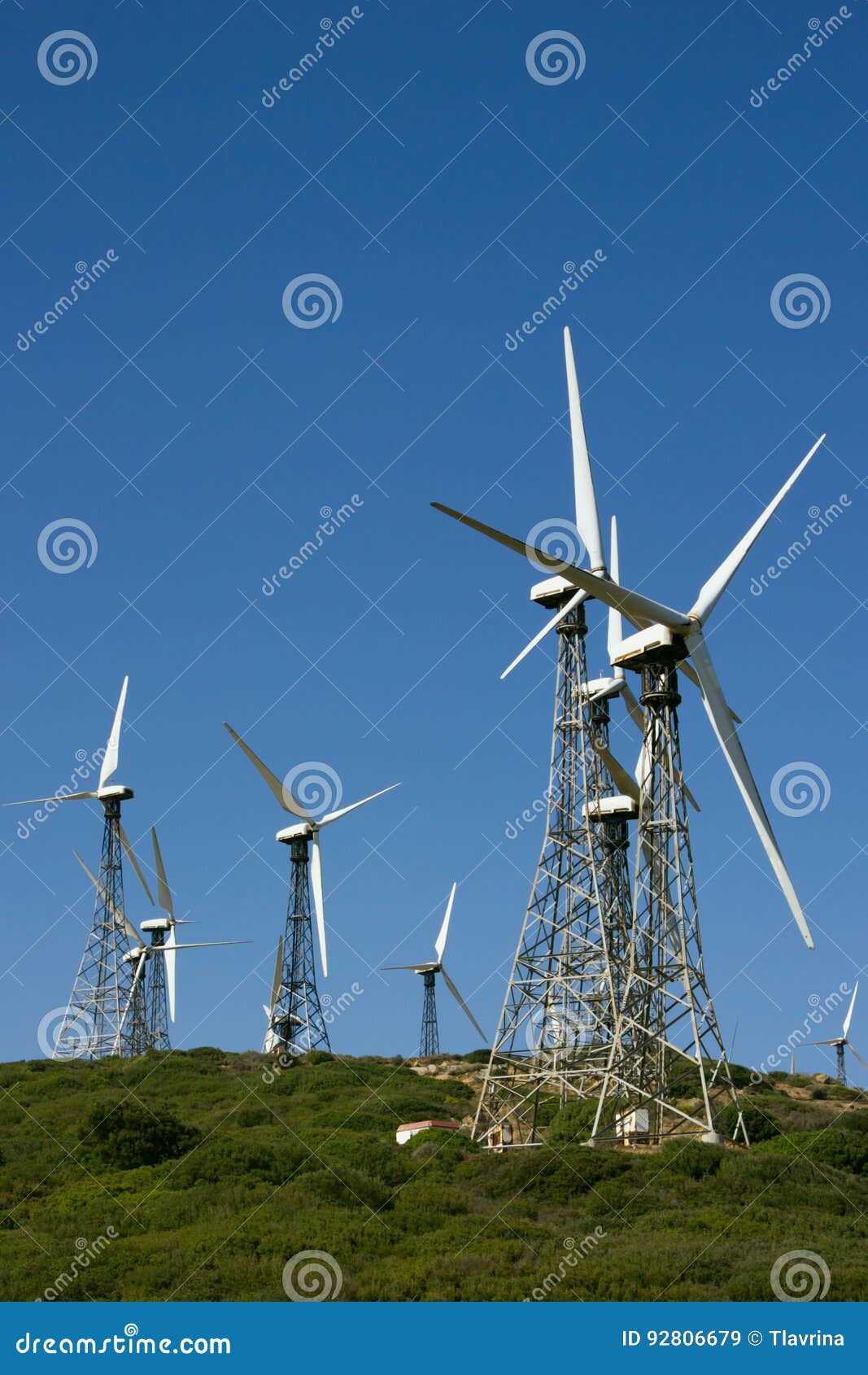 Set of Wind Power Mill Towers Against Blue Sky Stock Image - Image of ...