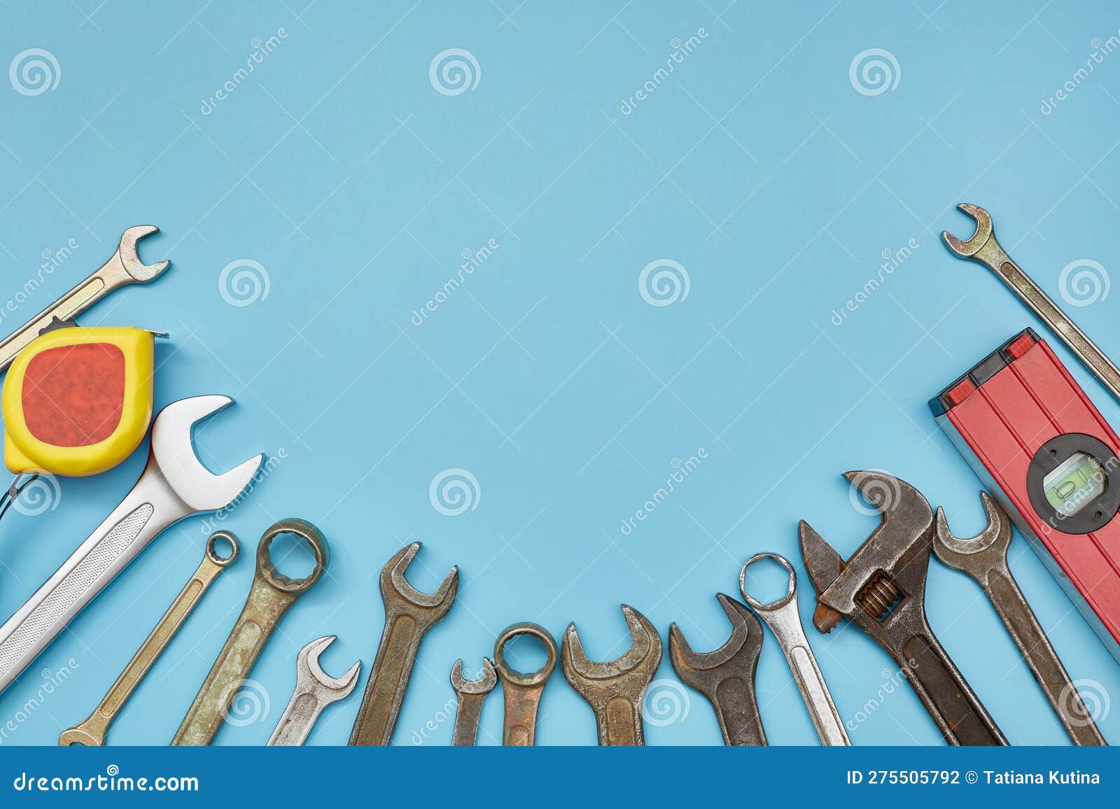 A Set of Wrenches and Working Tools on a Blue Background with a Copy ...